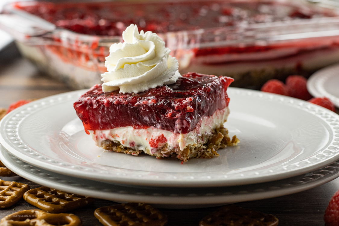 Classic Raspberry Pretzel Salad - Feeding Your Fam