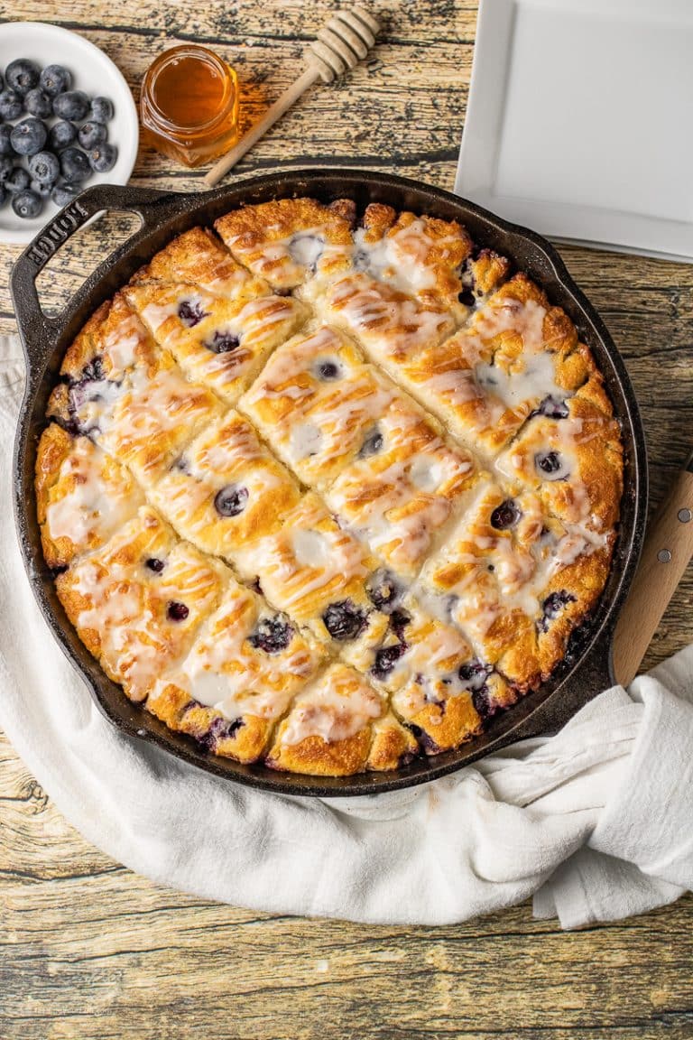 Blueberry Butter Swim Biscuits in a Cast Iron Skillet - Feeding Your Fam